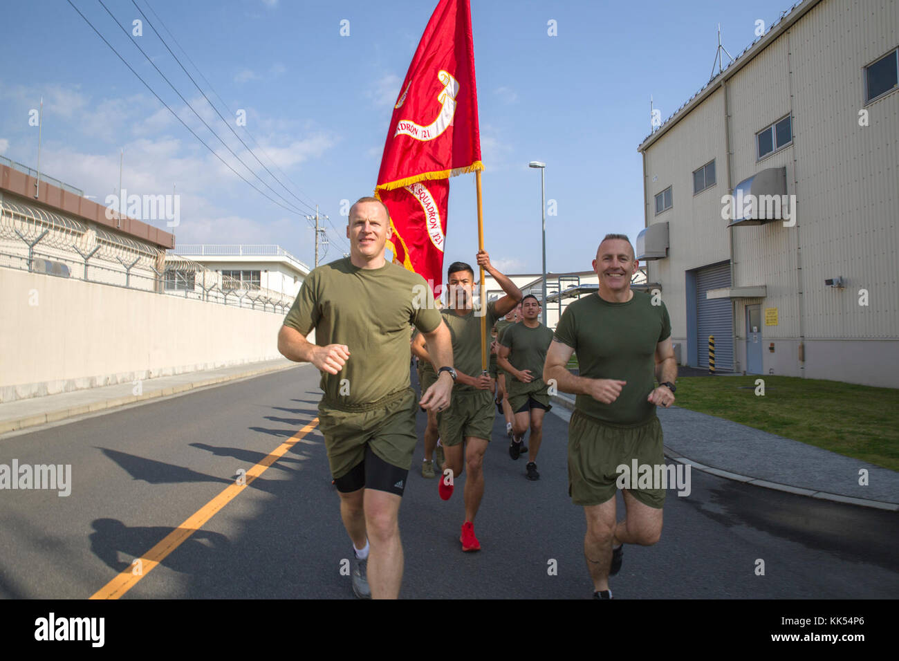 U.S. Marines and Sailors with Marine Aircraft Group (MAG) 12 run in ...
