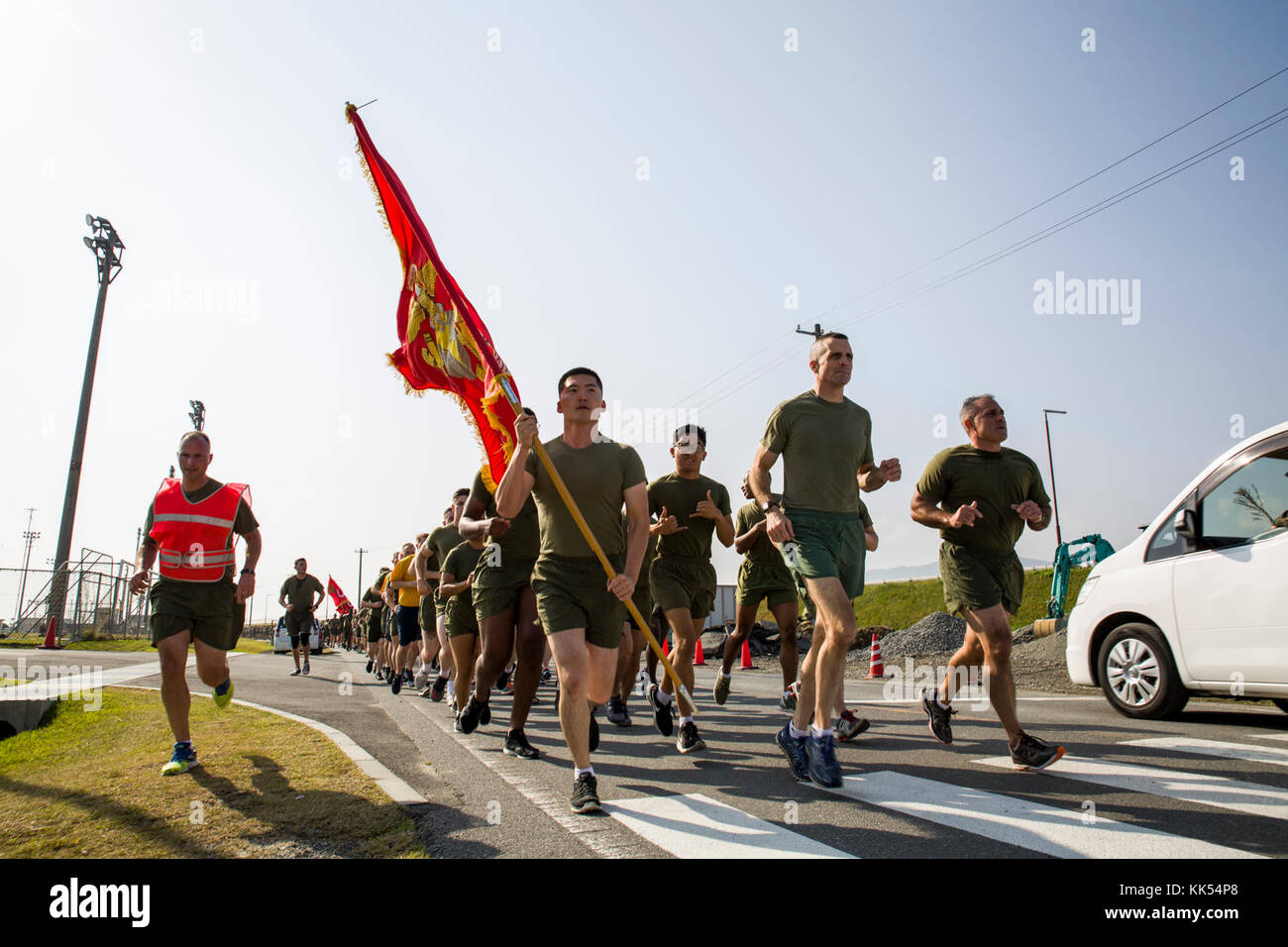 U.S. Marines and Sailors with Marine Aircraft Group (MAG) 12 run in ...
