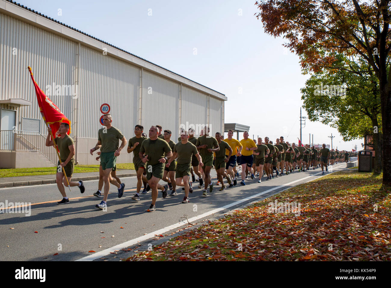 U.S. Marines and Sailors with Marine Aircraft Group (MAG) 12 run in ...