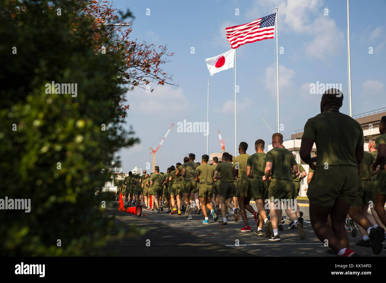 U.S. Marines and Sailors with Marine Aircraft Group (MAG) 12 run in ...