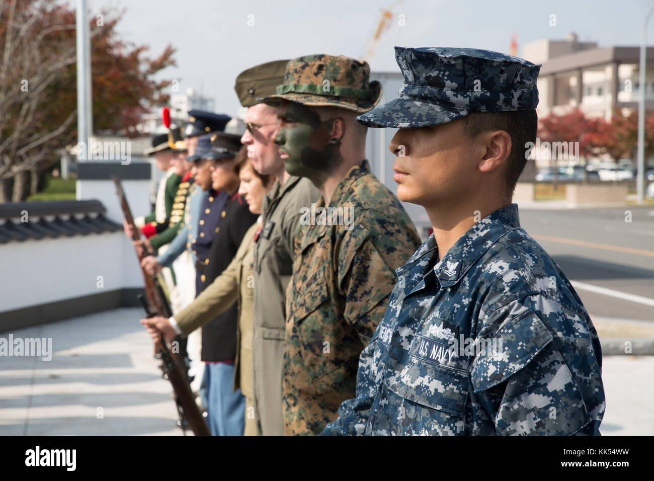 U.S. Marines and Sailors participating in a birthday pageant ceremony ...