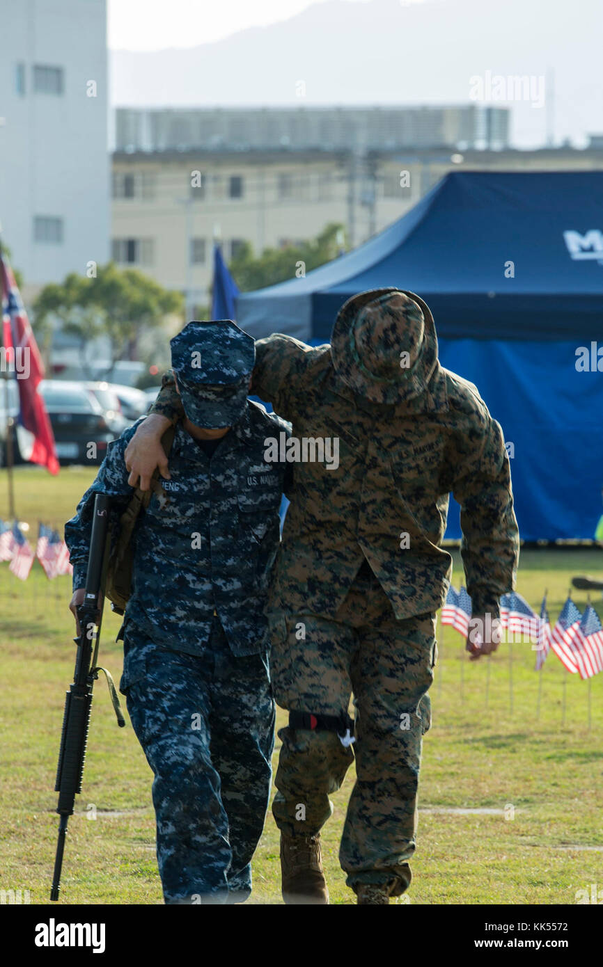 U.S. Navy Cryogenic Technician 2nd Class Shi Cheng, left, with the ...