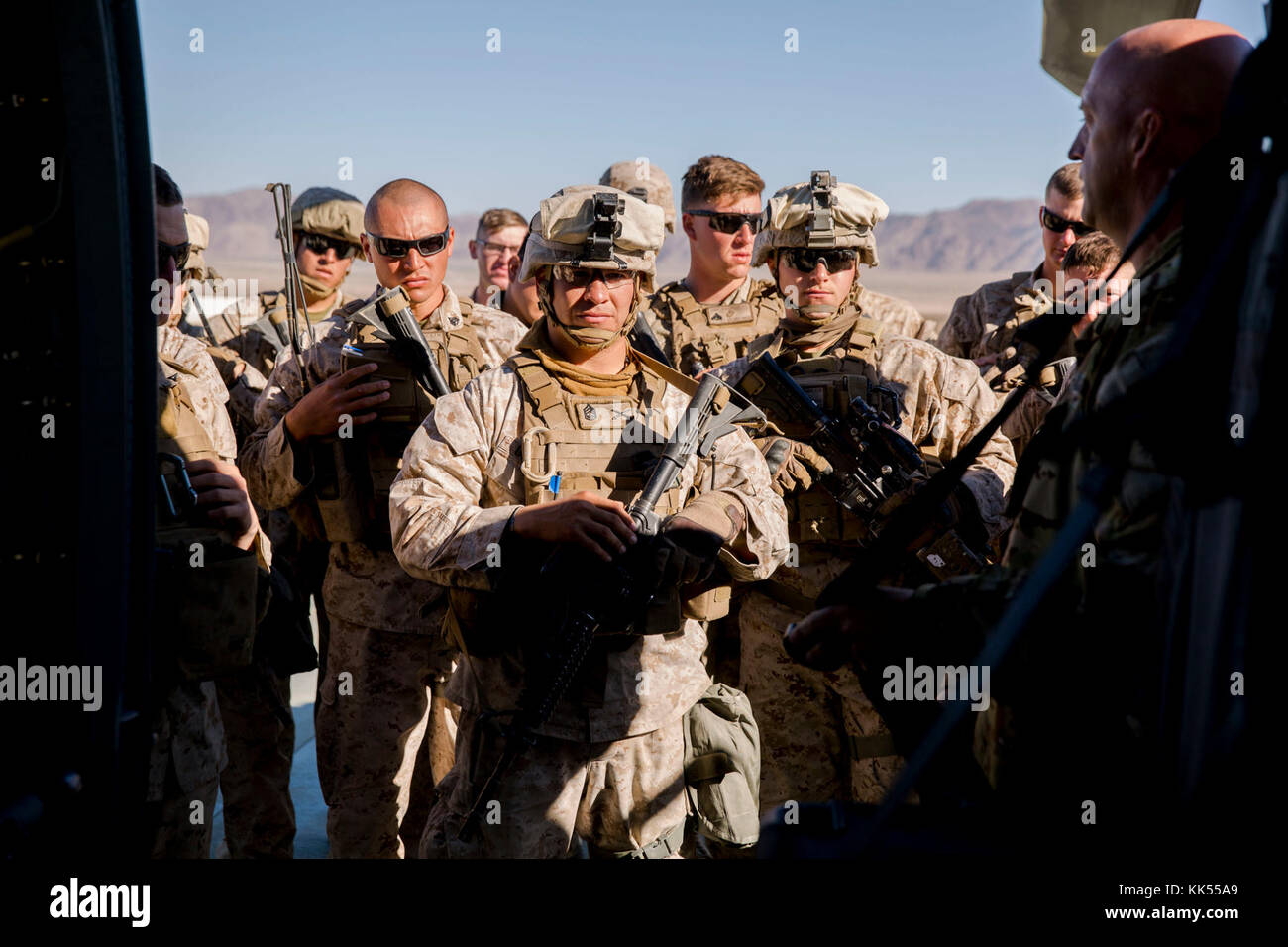 U.S. Marines with 2nd battalion, 4th Marine Regiment familiarize themselves with the UH-60 Black ...