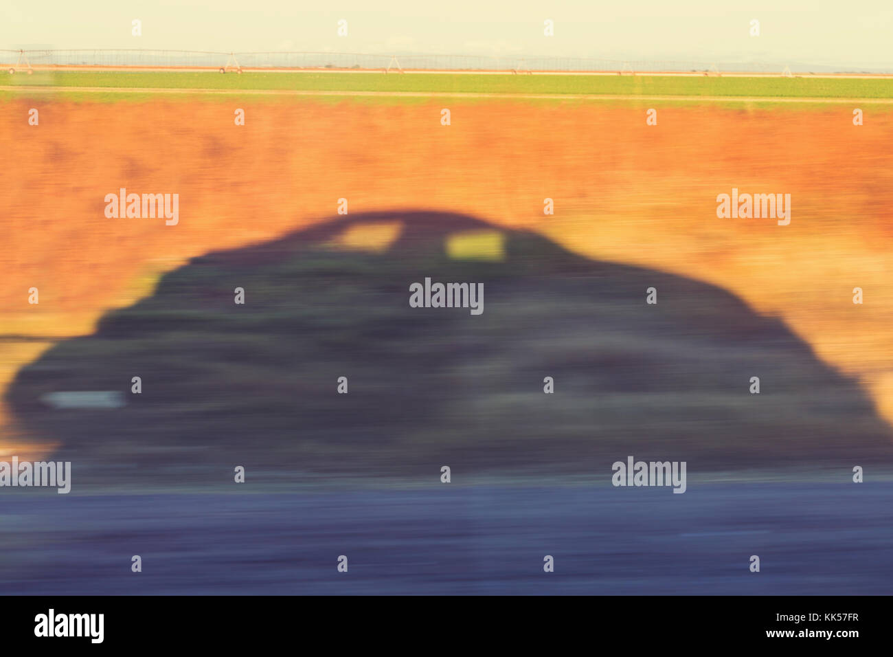 Moving car shadow Stock Photo - Alamy