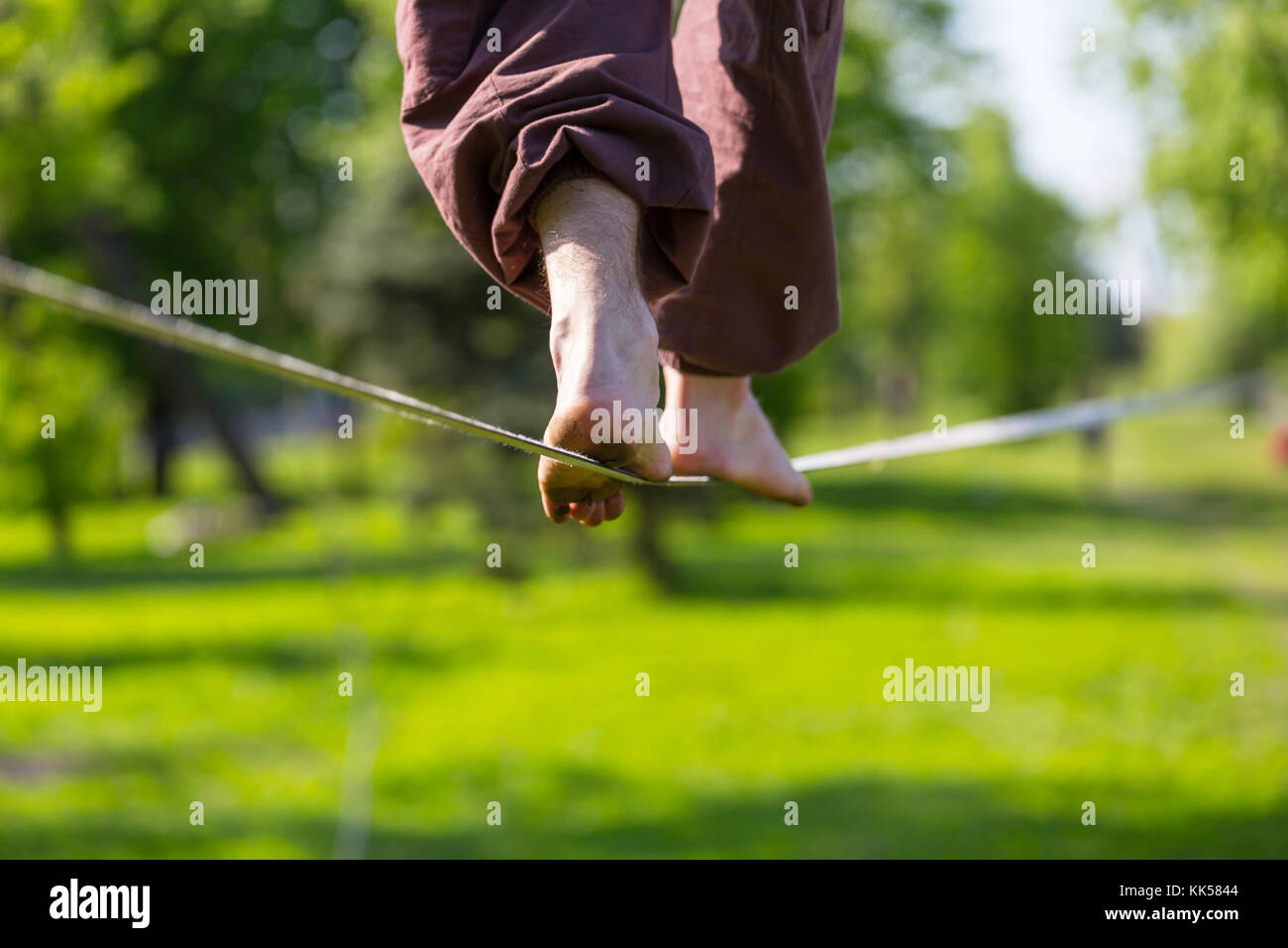 Person slacklining hi-res stock photography and images - Alamy