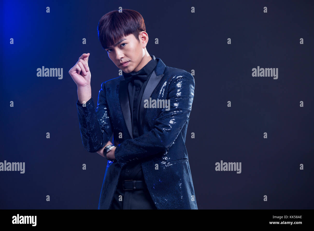 Young Chinese male magician Stock Photo - Alamy