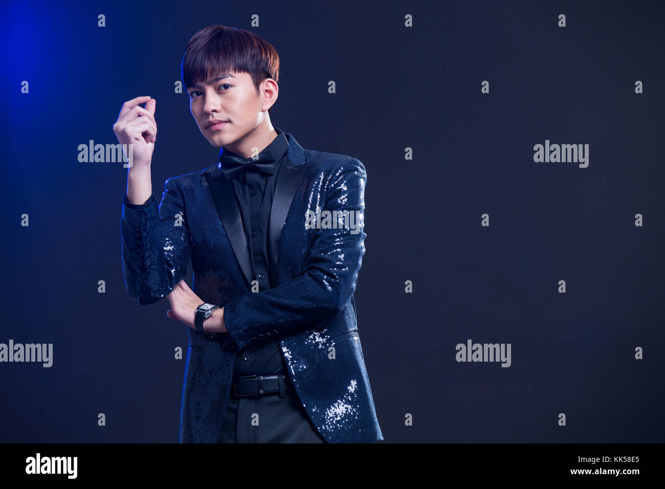 Young Chinese male magician Stock Photo - Alamy