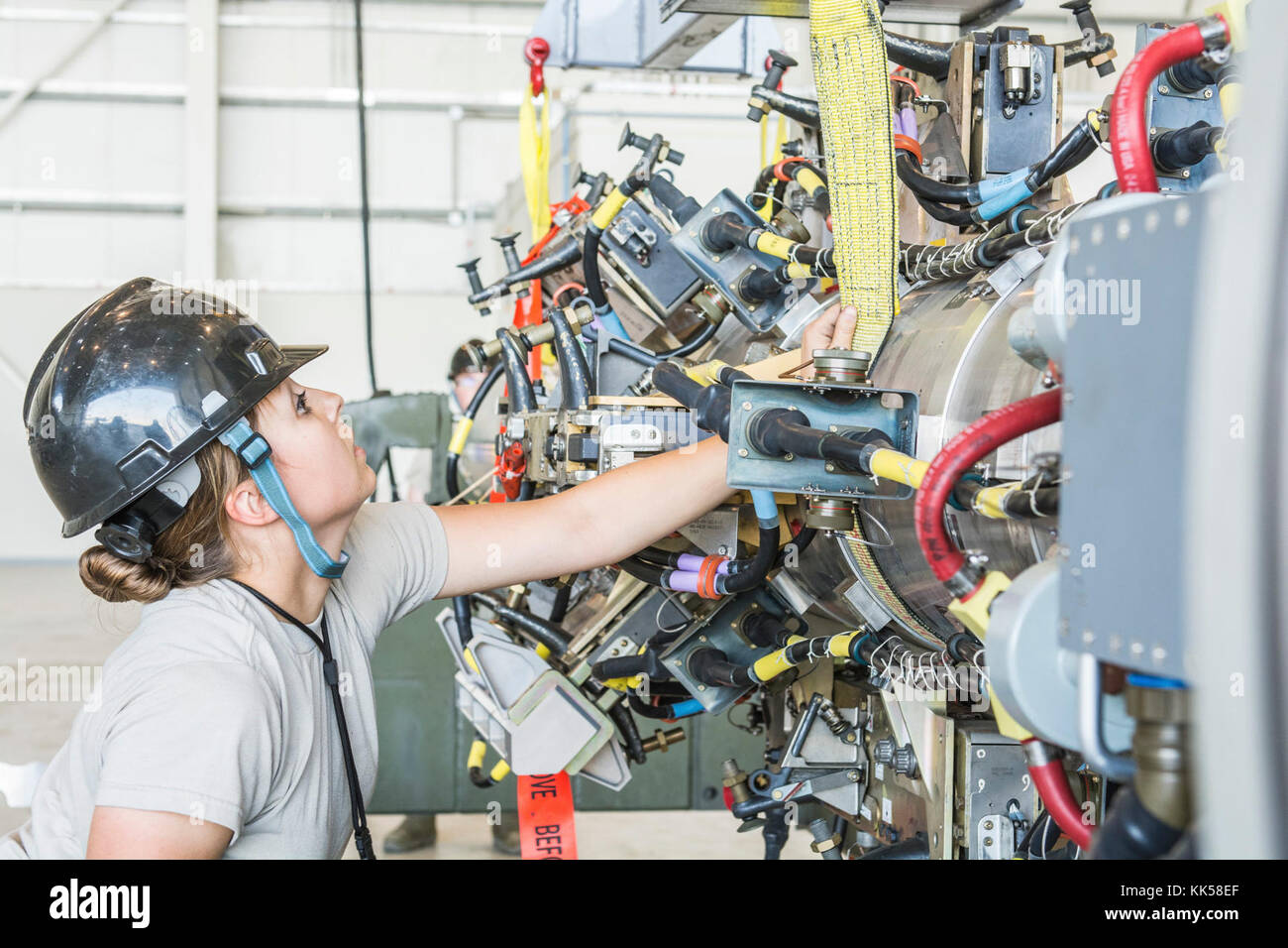 U.S. Airmen with the 379th Expeditionary Maintenance Squadron prepare a ...