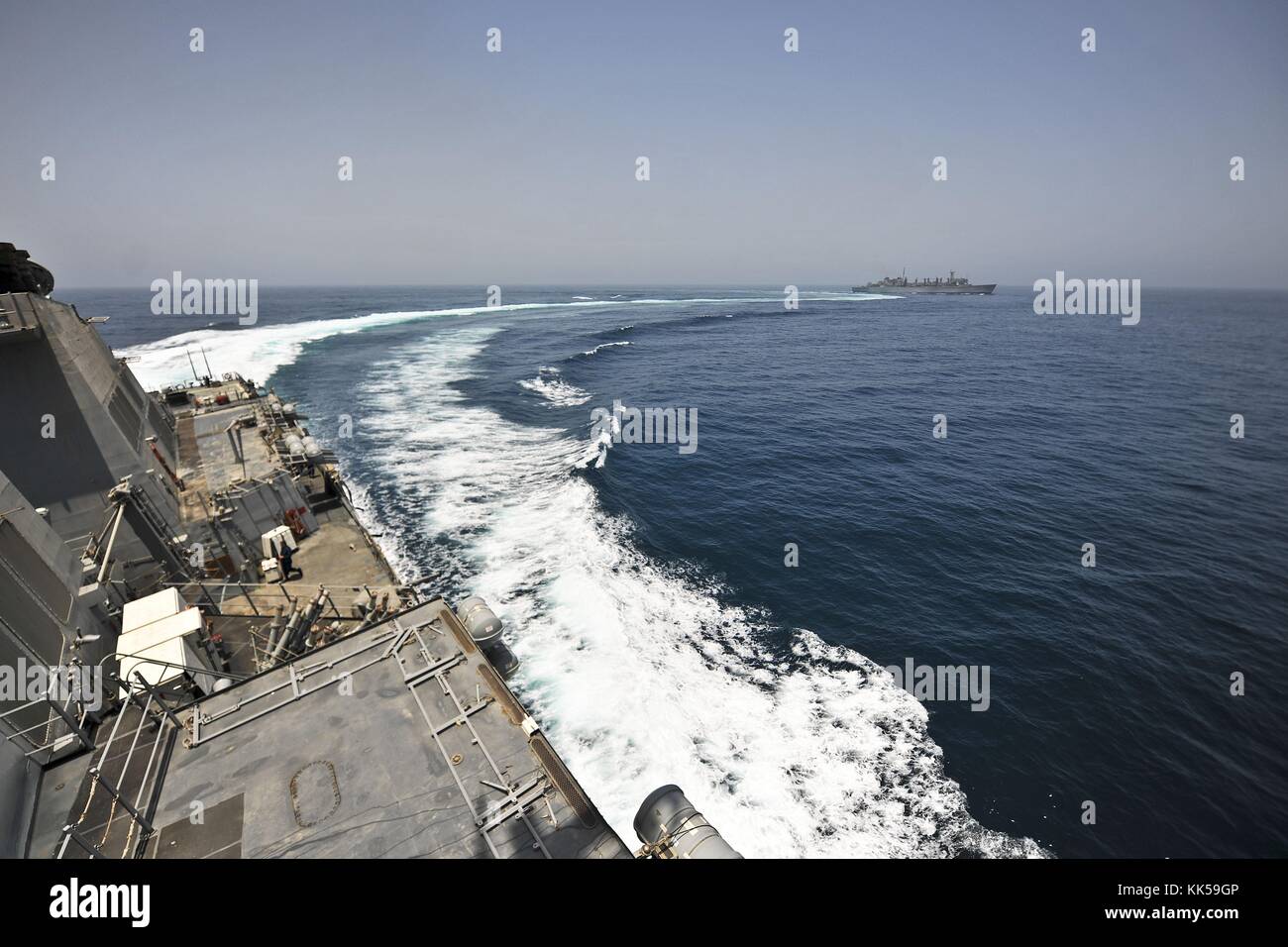 The guided-missile destroyer USS Porter DDG 78 performs a flank-speed ...