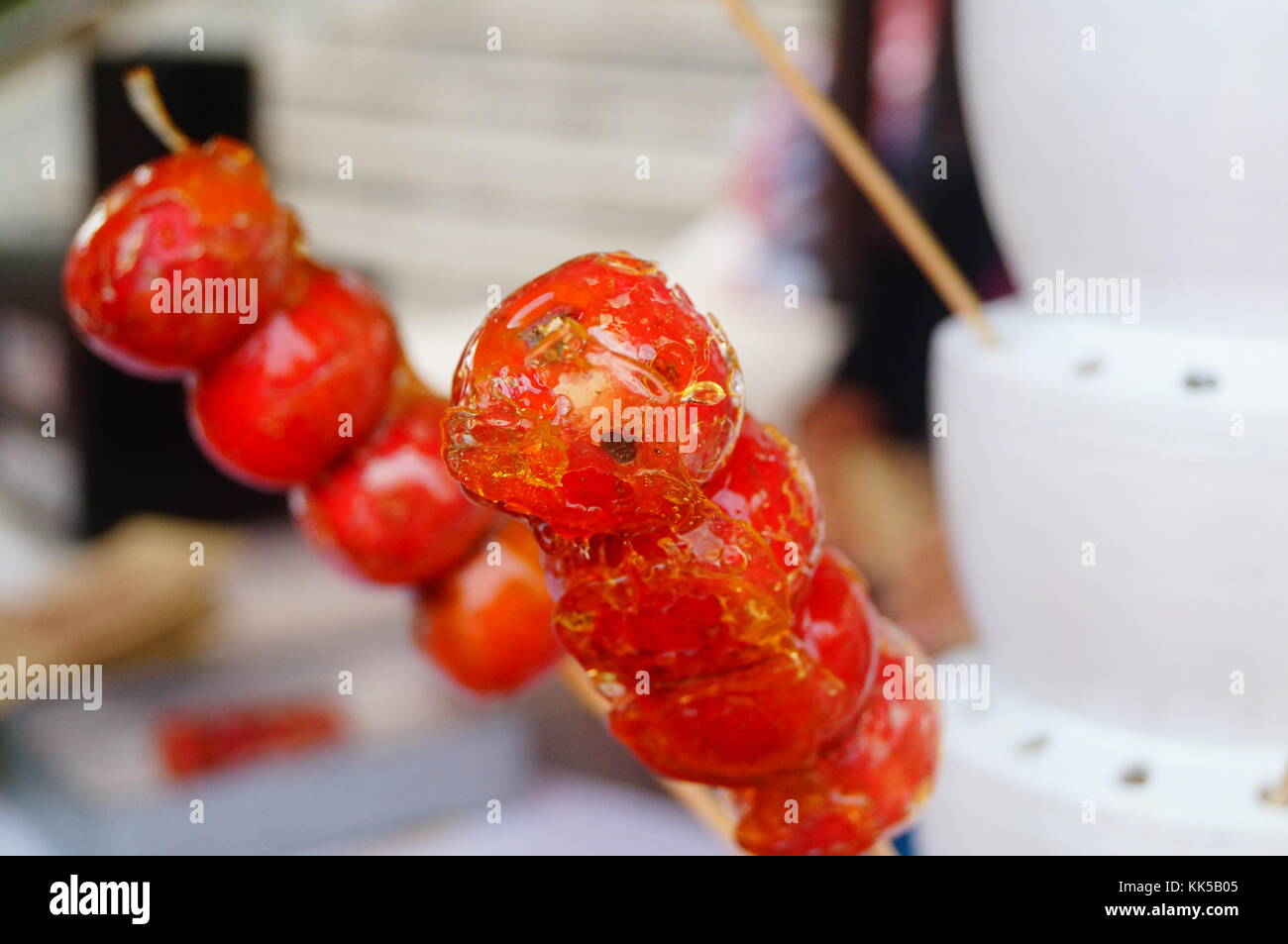 Ice-sugar gourd is a traditional Chinese delicacy Stock Photo - Alamy