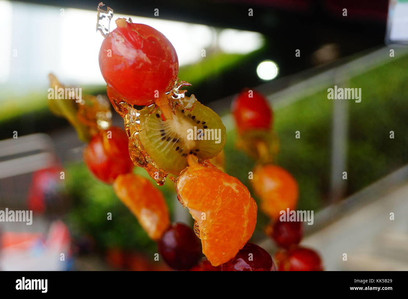 Ice-sugar gourd is a traditional Chinese delicacy Stock Photo - Alamy