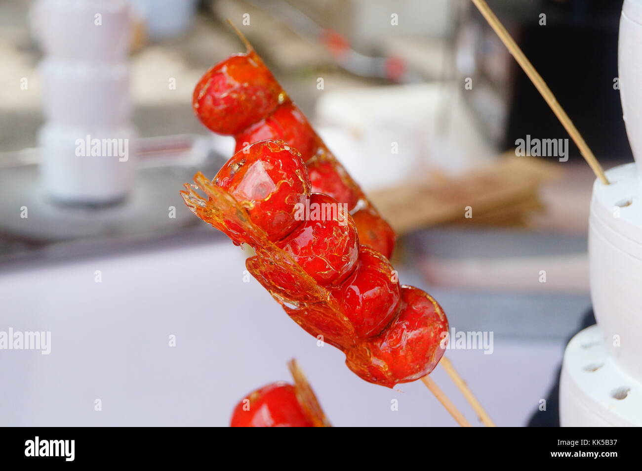 Ice-sugar gourd is a traditional Chinese delicacy Stock Photo - Alamy