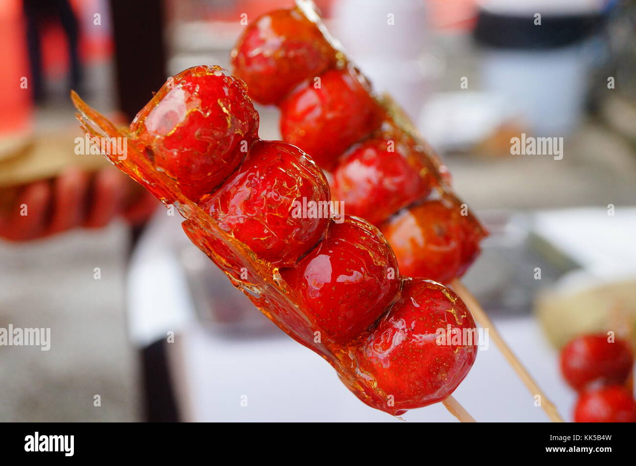 Ice-sugar gourd is a traditional Chinese delicacy Stock Photo - Alamy