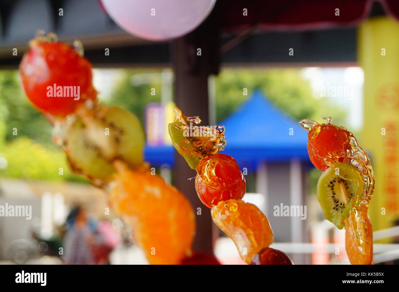 Ice-sugar gourd is a traditional Chinese delicacy Stock Photo - Alamy