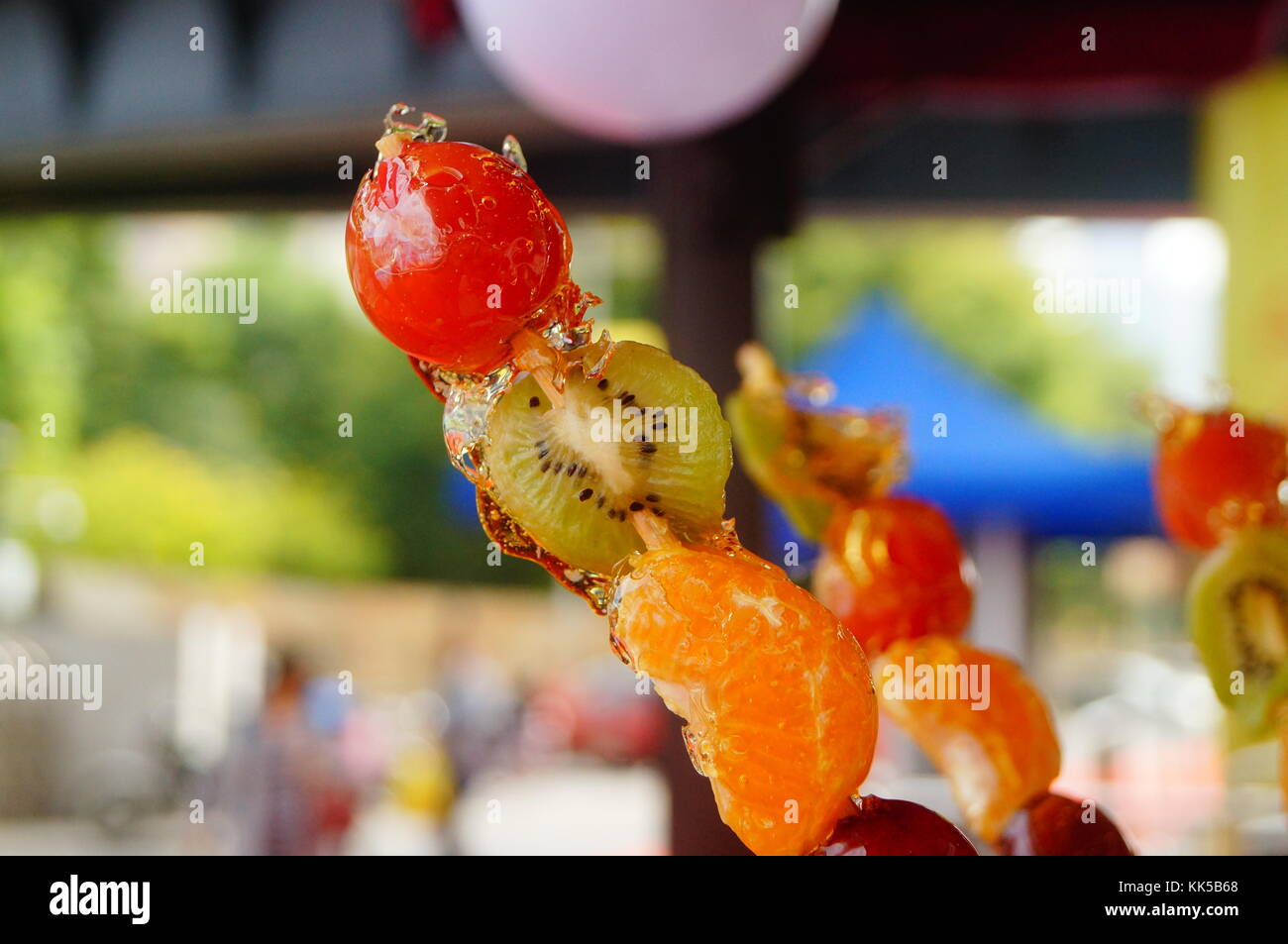 Ice-sugar gourd is a traditional Chinese delicacy Stock Photo - Alamy