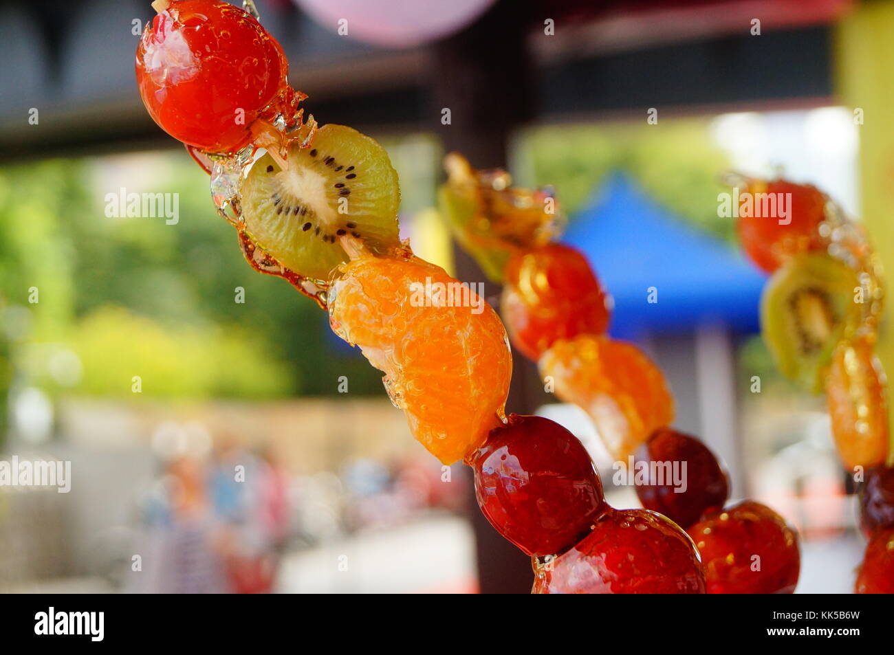 Ice-sugar gourd is a traditional Chinese delicacy Stock Photo - Alamy