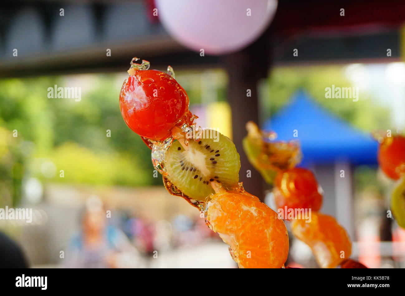 Ice-sugar gourd is a traditional Chinese delicacy Stock Photo - Alamy