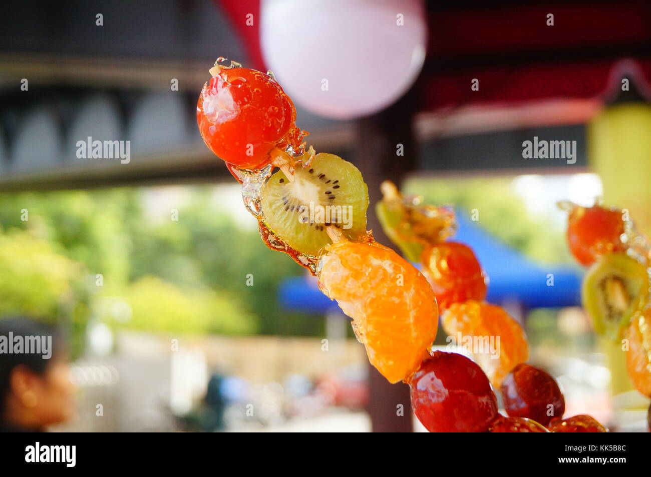 Ice-sugar gourd is a traditional Chinese delicacy Stock Photo - Alamy