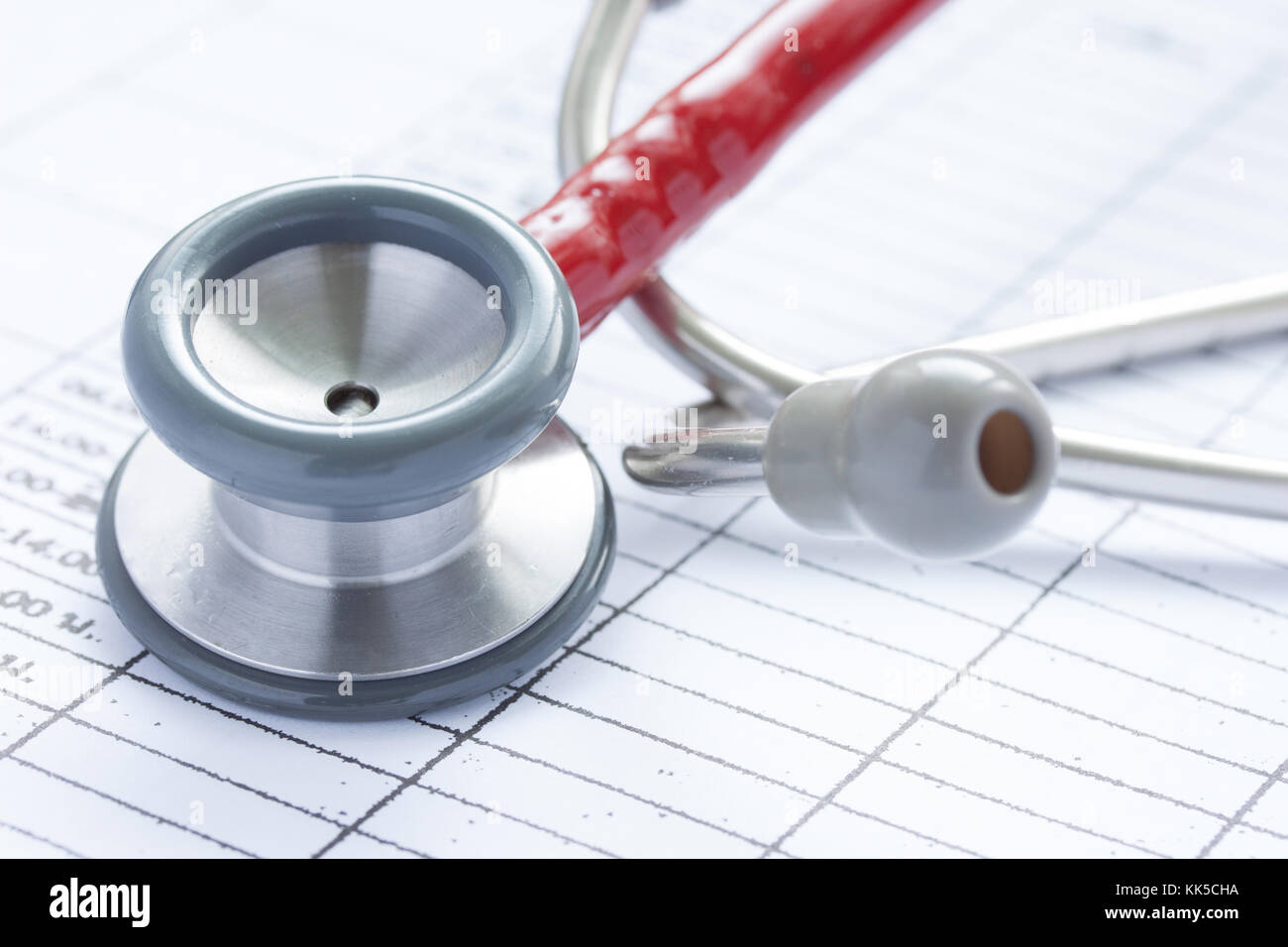 Stethoscope and time sheet Stock Photo - Alamy