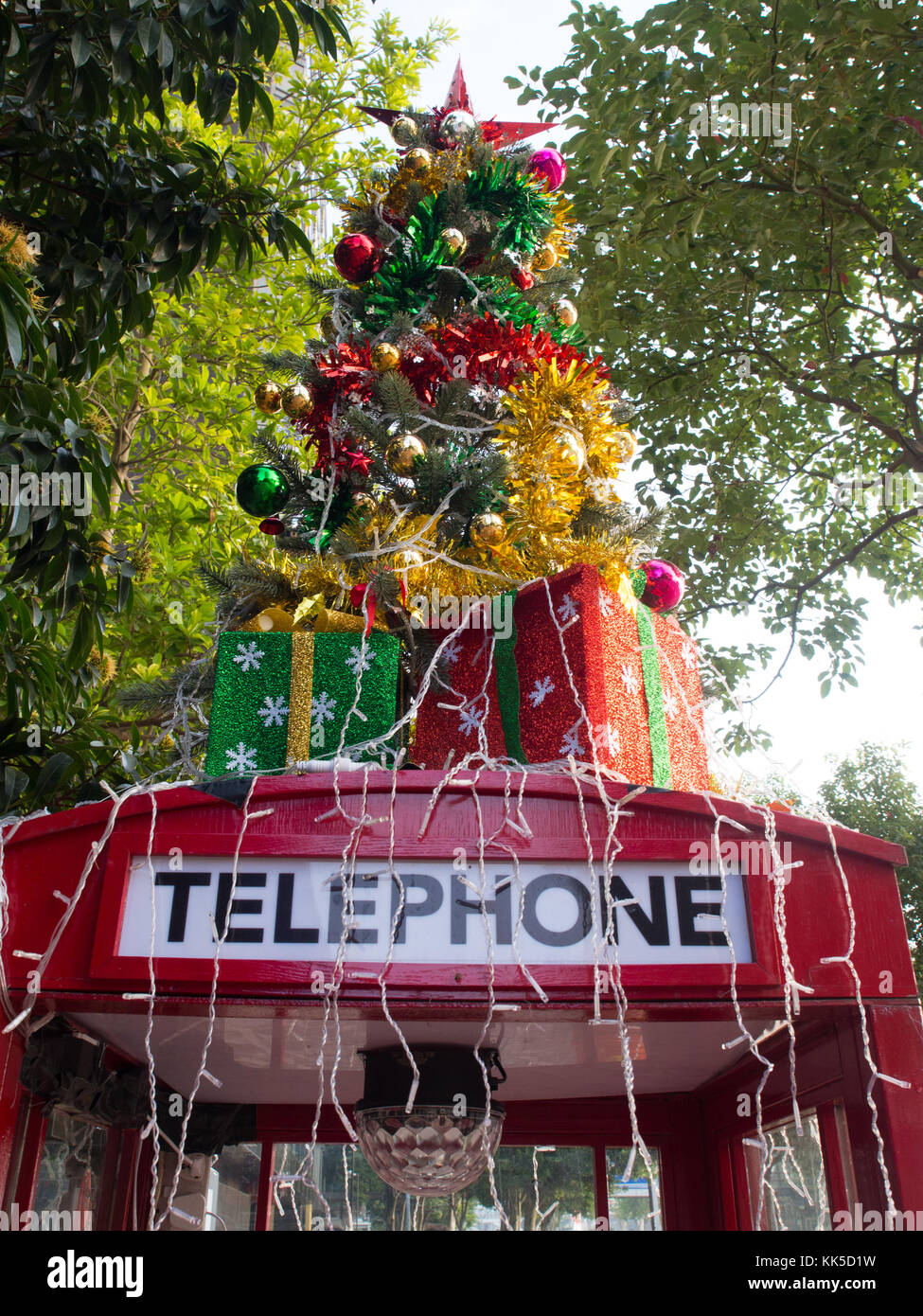 Christmas Decorated Telephone Booth Stock Photo - Alamy