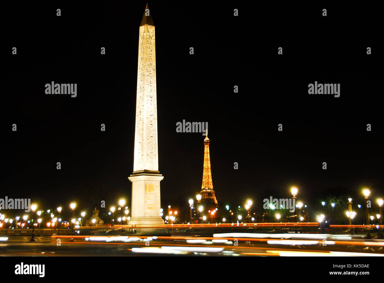 Place de la Concorde at night with the Eiffel Tower in the background ...