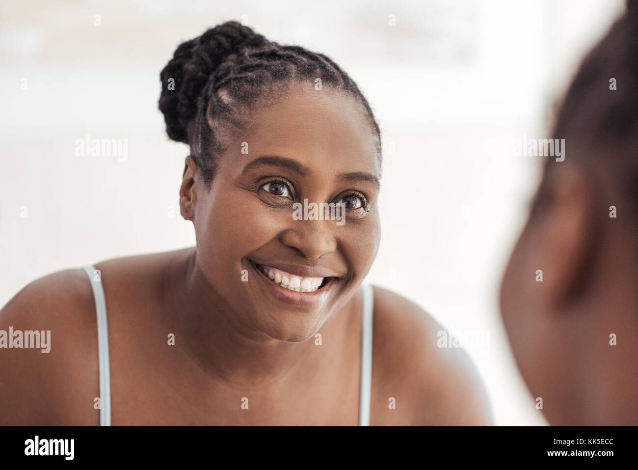 Young black woman african american hi-res stock photography and images ...