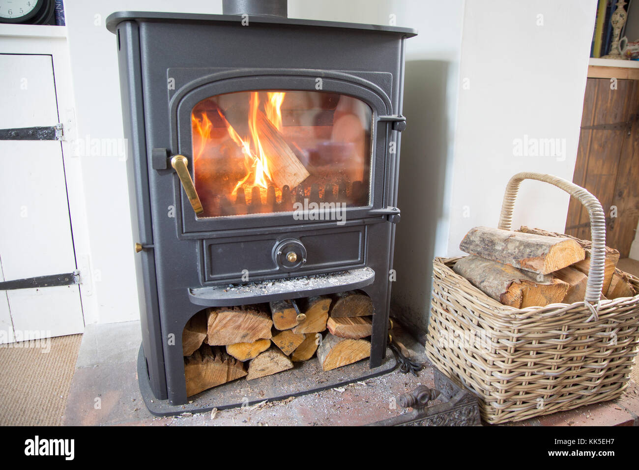 Warm fire flames logs burning in ClearView domestic multifuel stove ...
