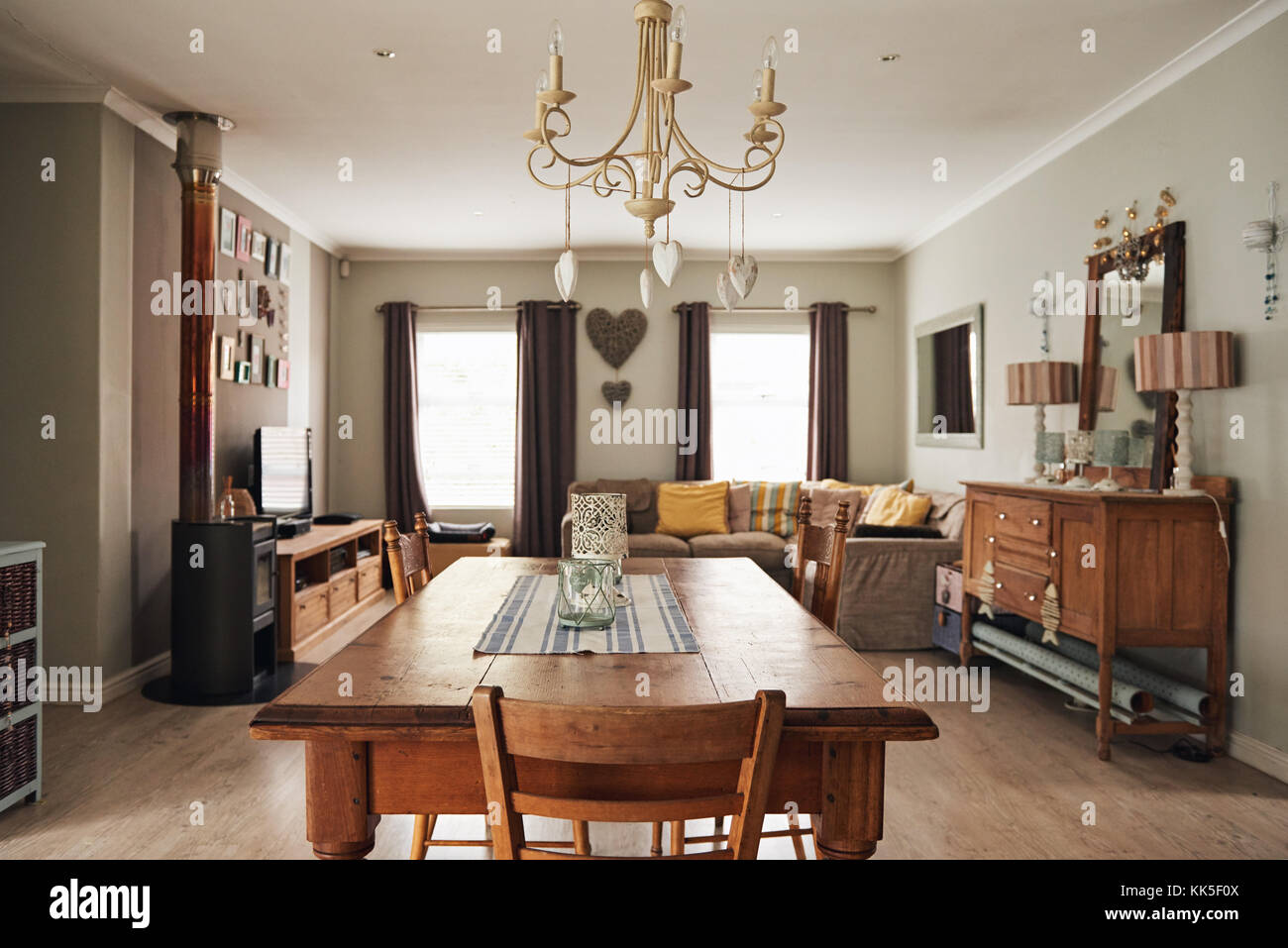 Dining table and living room in a suburban home Stock Photo - Alamy