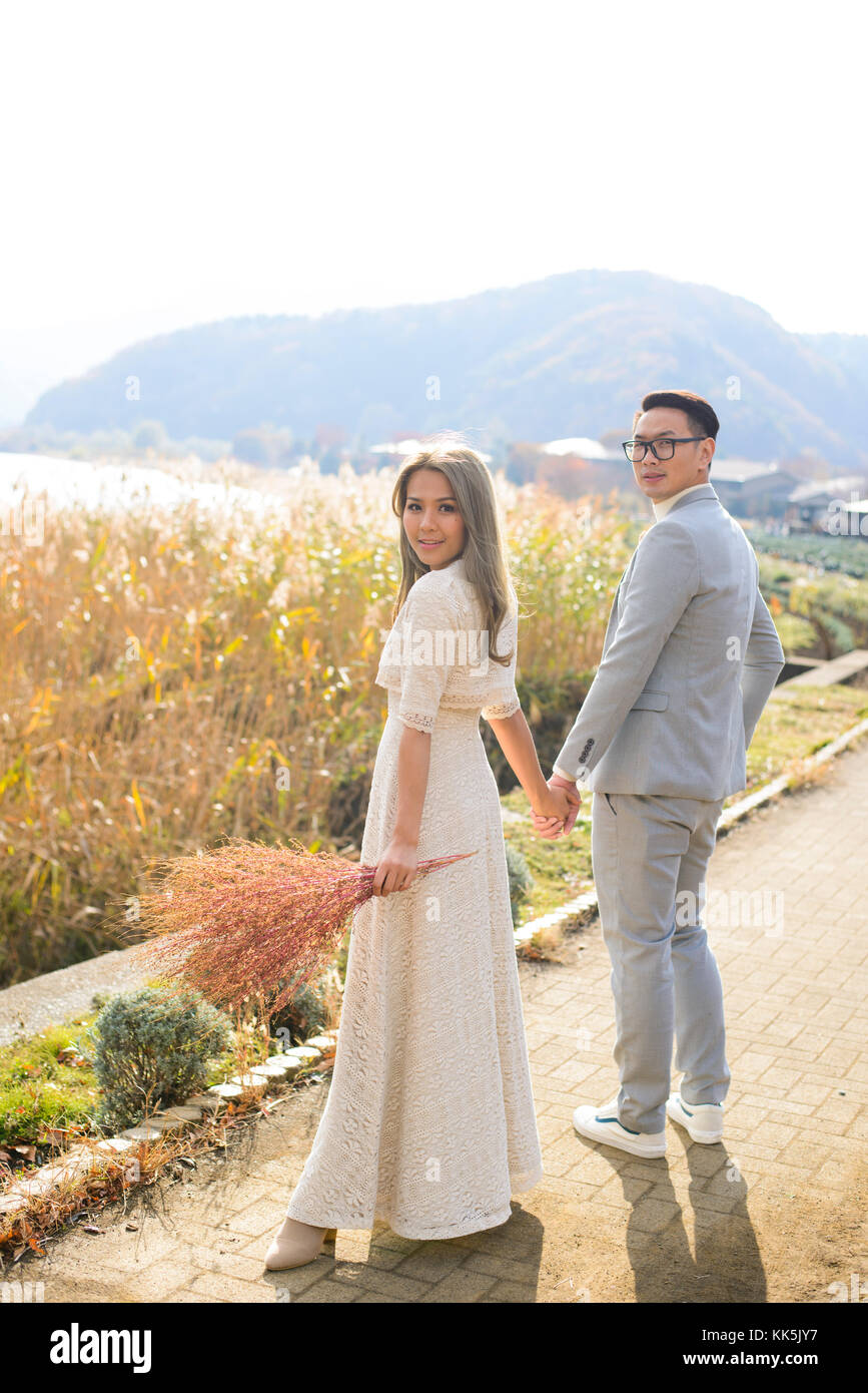 Couple in love stand together at Japan Stock Photo - Alamy