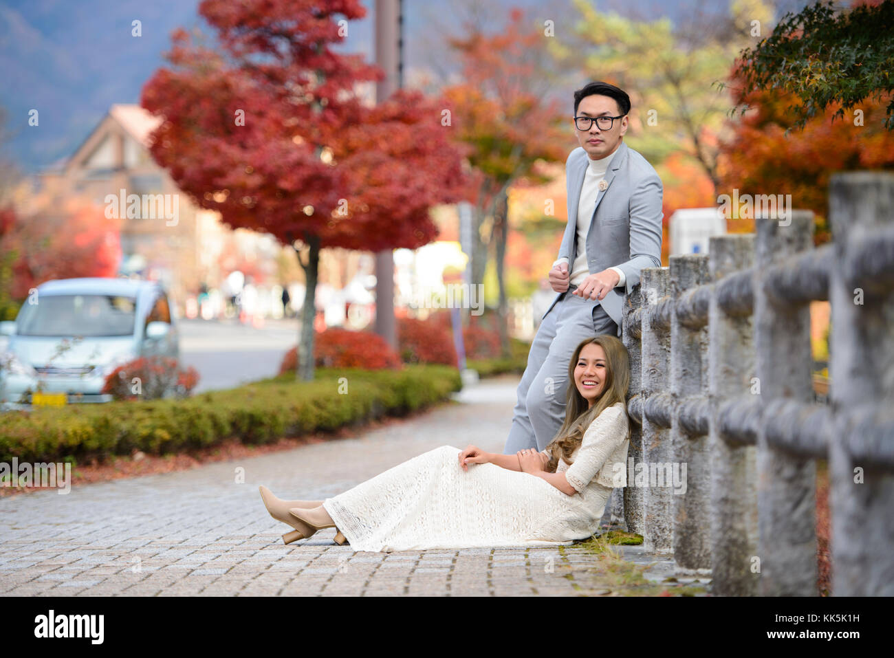 Young couple in romantic moment with autumn scene Stock Photo - Alamy