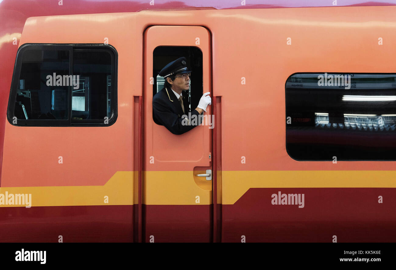 Train driver at Tokyo station Stock Photo - Alamy