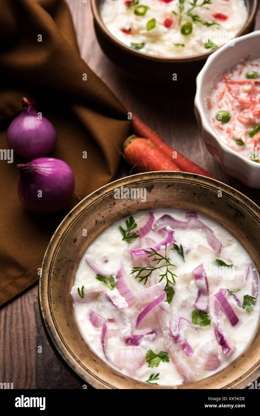 Onion, Carrot, radish raita also known as Koshimbir. It a condiment ...