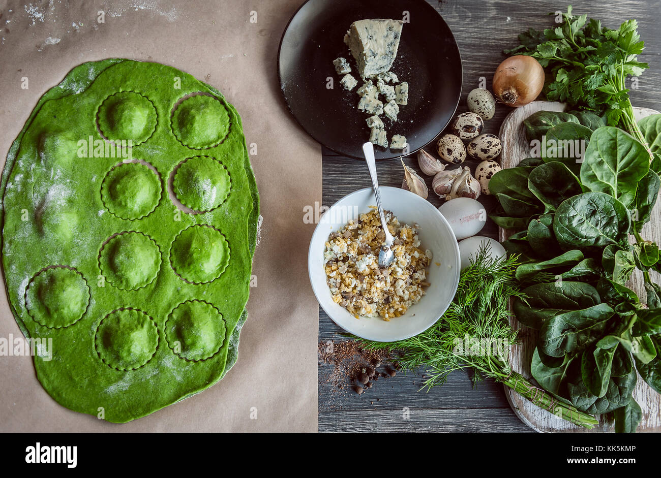 chef step by step, preparing a green ravioli with the addition of ...