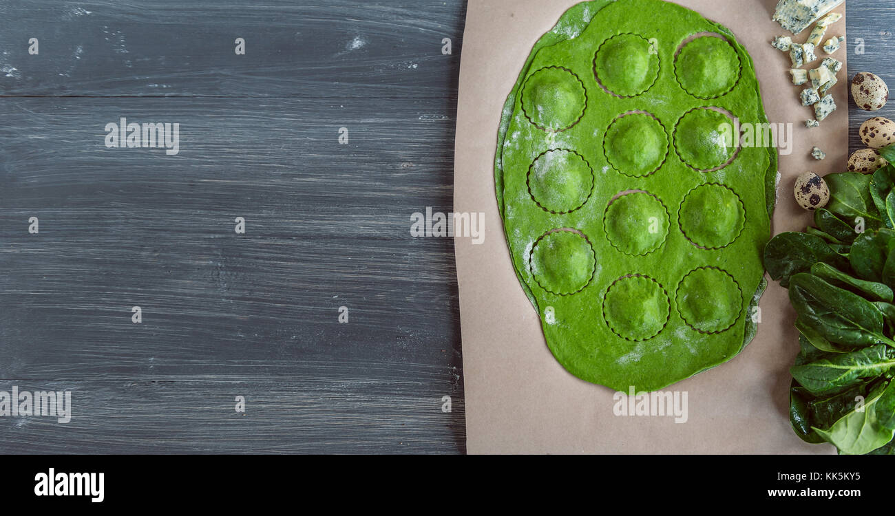 chef step by step, preparing a green ravioli with the addition of ...