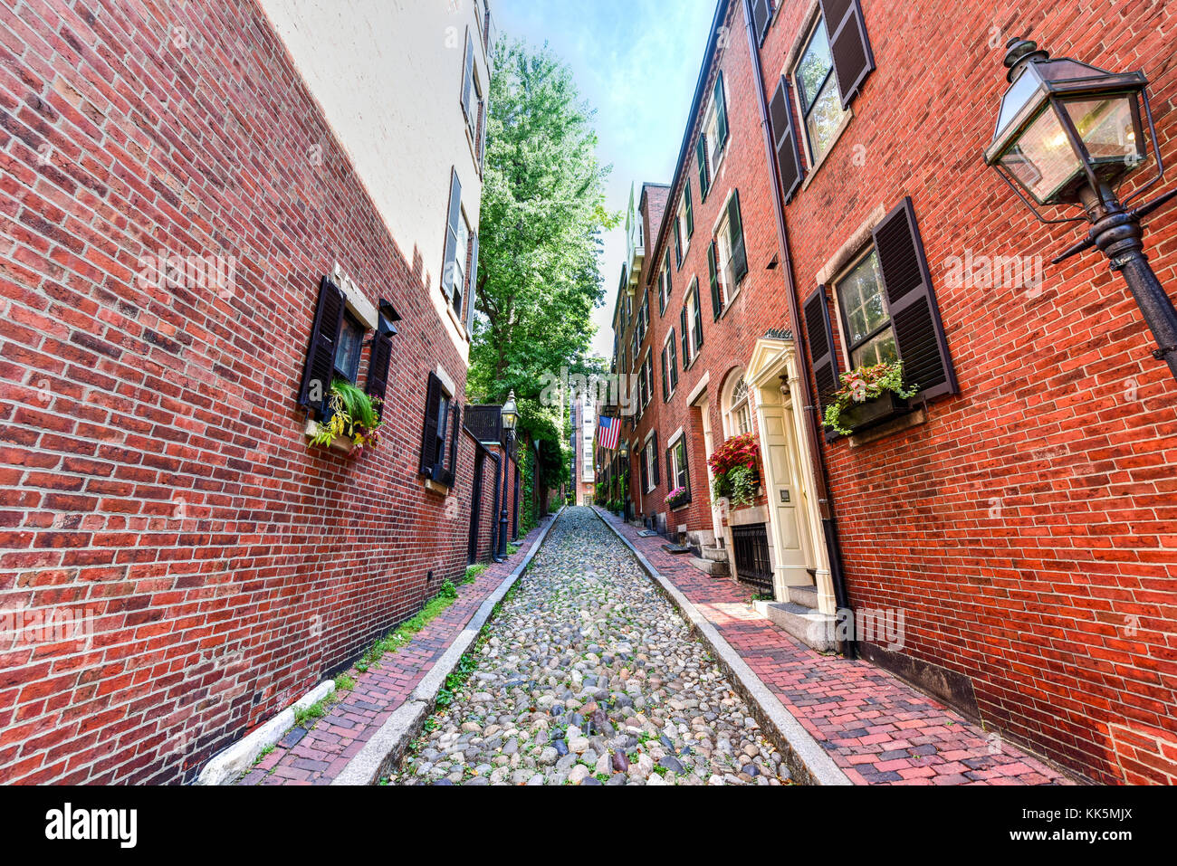 Acorn Street in Boston, Massachusetts. It is a narrow lane paved with ...