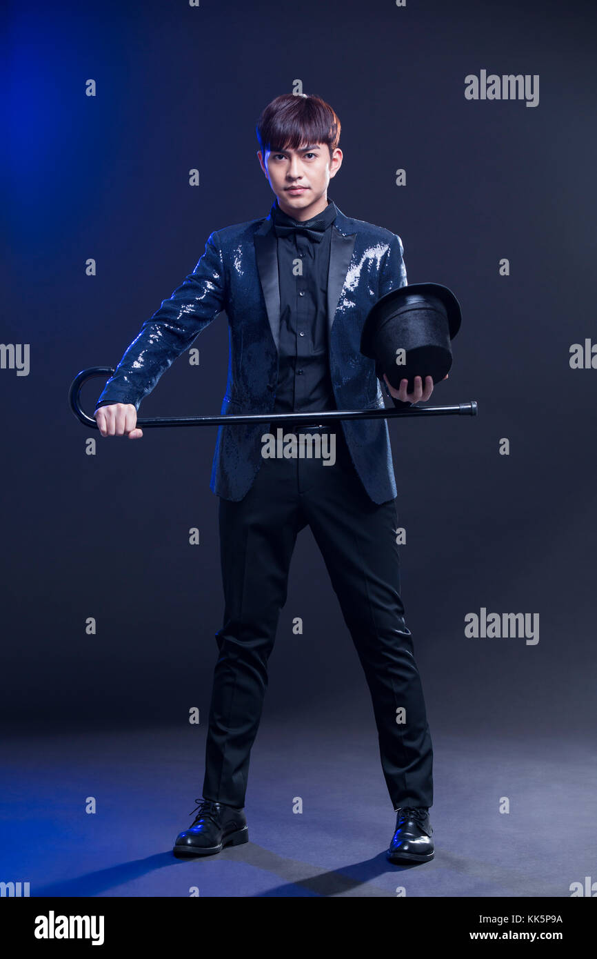 Young Chinese male magician Stock Photo - Alamy