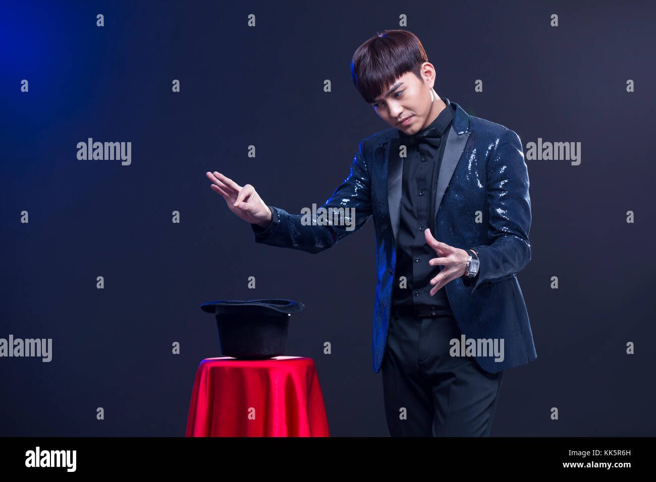 Man magician table hi-res stock photography and images - Alamy