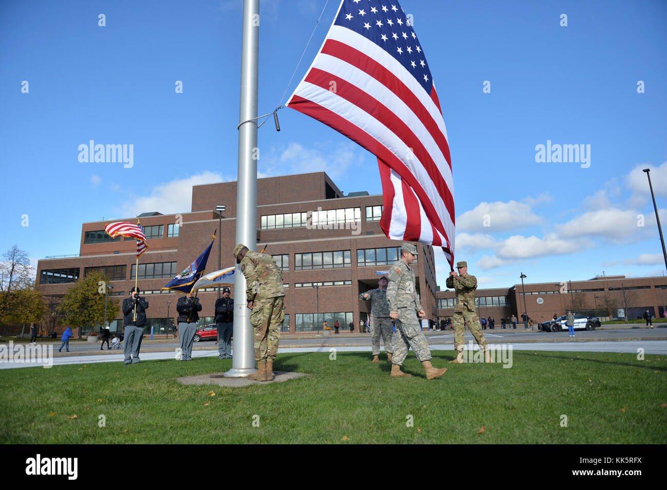 Members of University of Buffalo's Police Color Guard stand post while ...