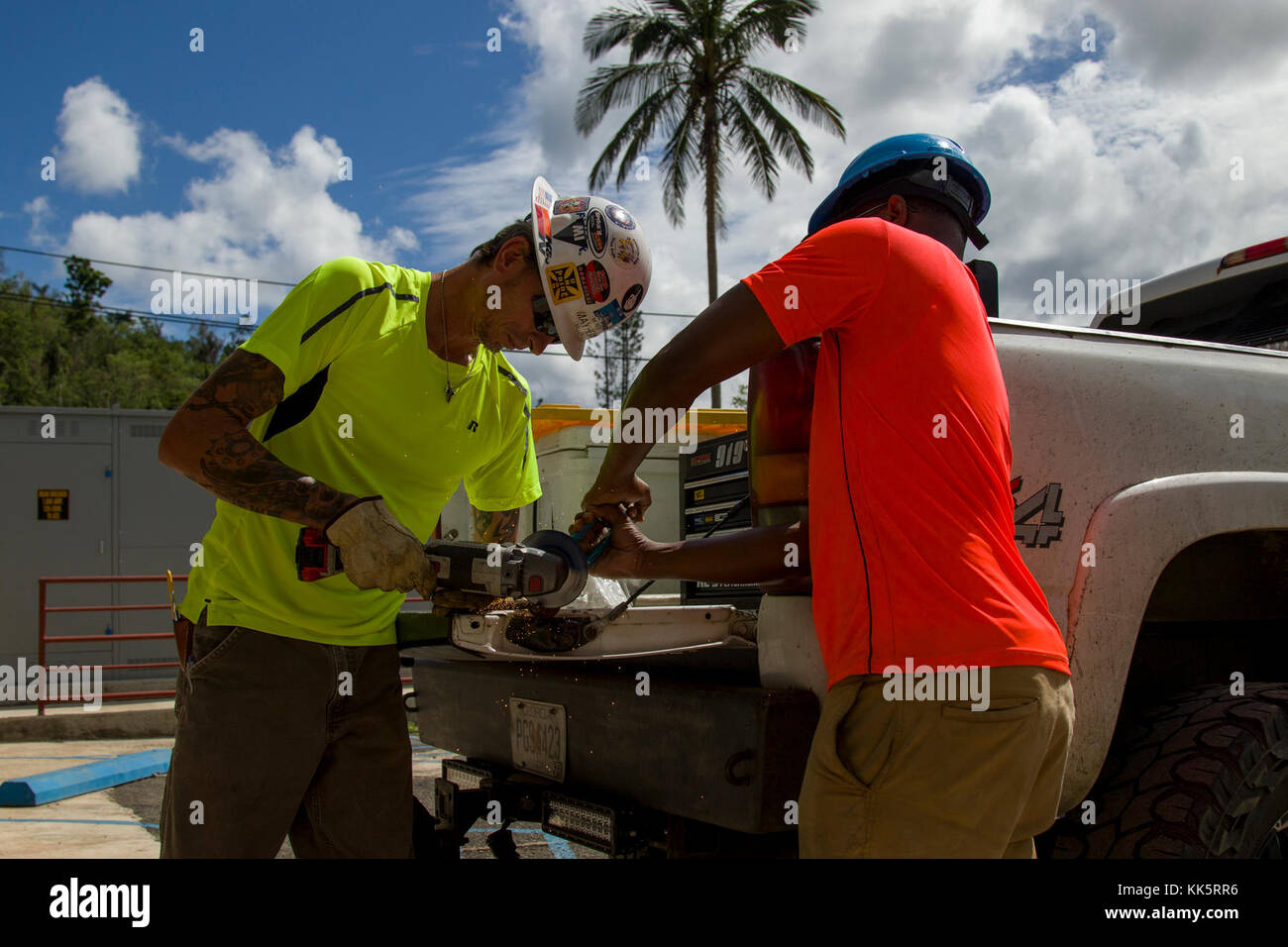 CASTAÑER, Puerto Rico – Monte Miller, left, an electrician contracted ...