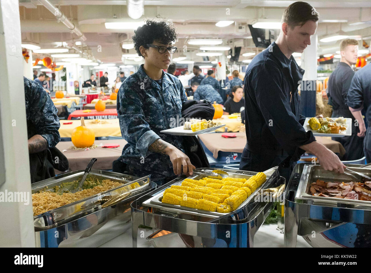 NORFOLK, Va (Nov. 23, 2017) Sailors make plates at a Thanksgiving meal ...