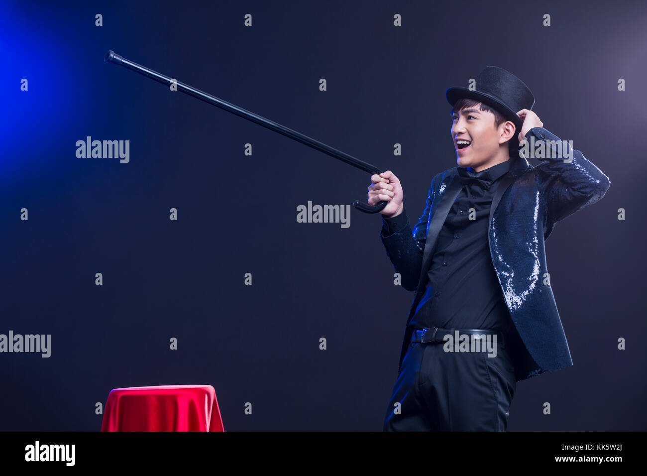Young Chinese male magician Stock Photo - Alamy