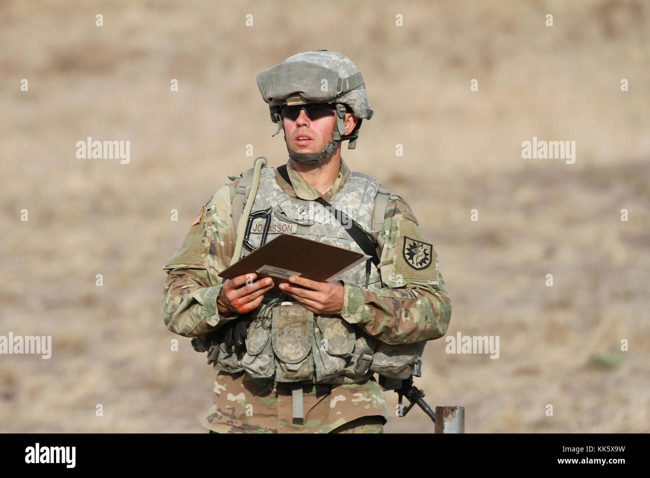 Staff Sgt. Jared Jonasson prepares to throw a grenade simulator Nov. 8 ...