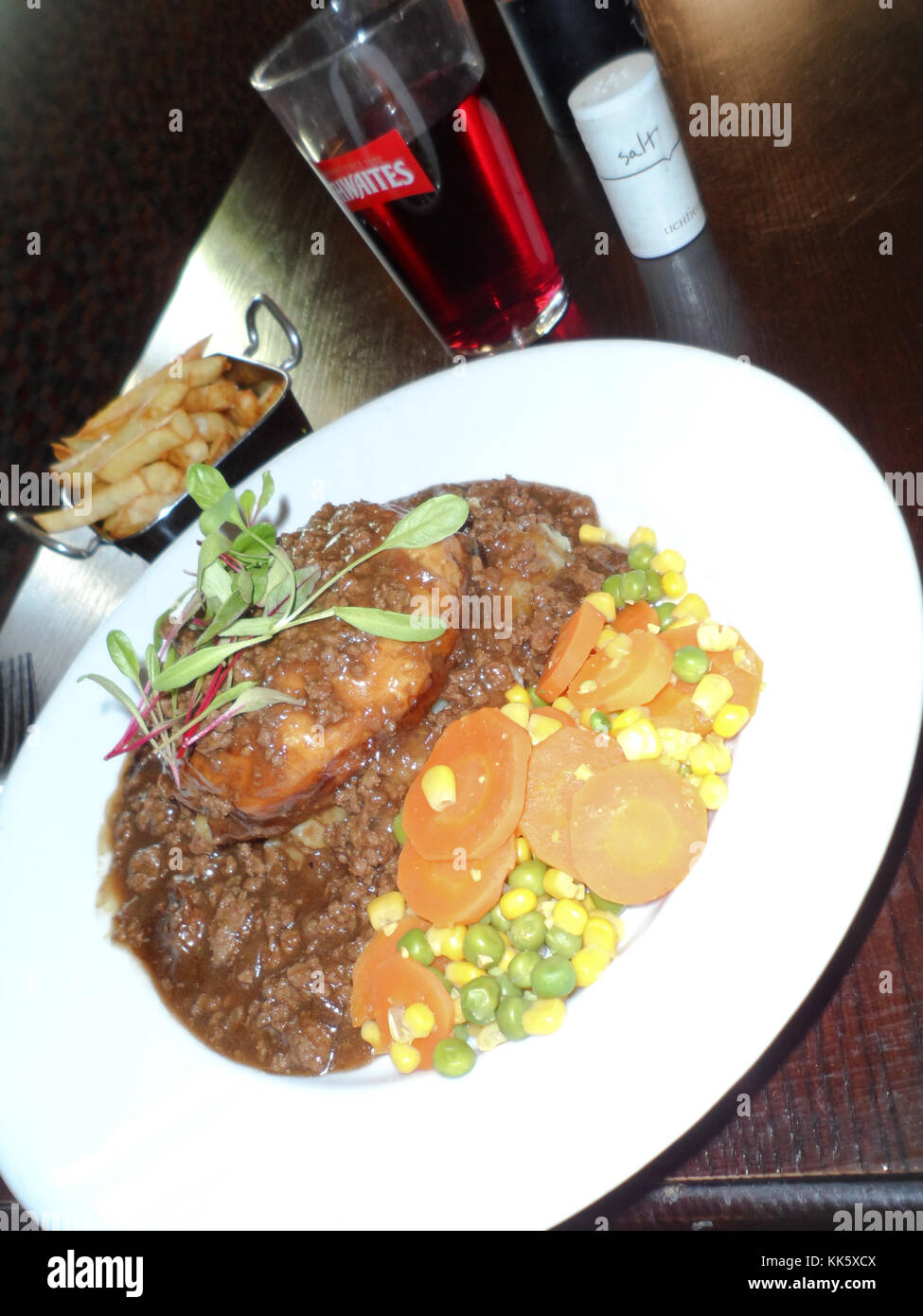 An English pub meal of Beef stew and Dumpling with vegetables and ...
