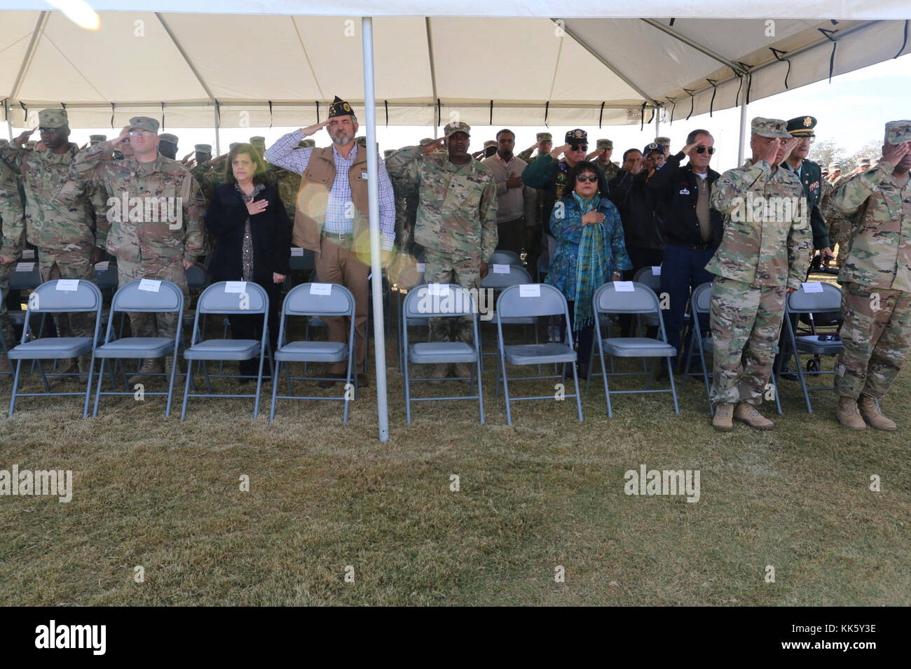 Soldiers and Retired Service Members salute Old Glory at the 1st ...