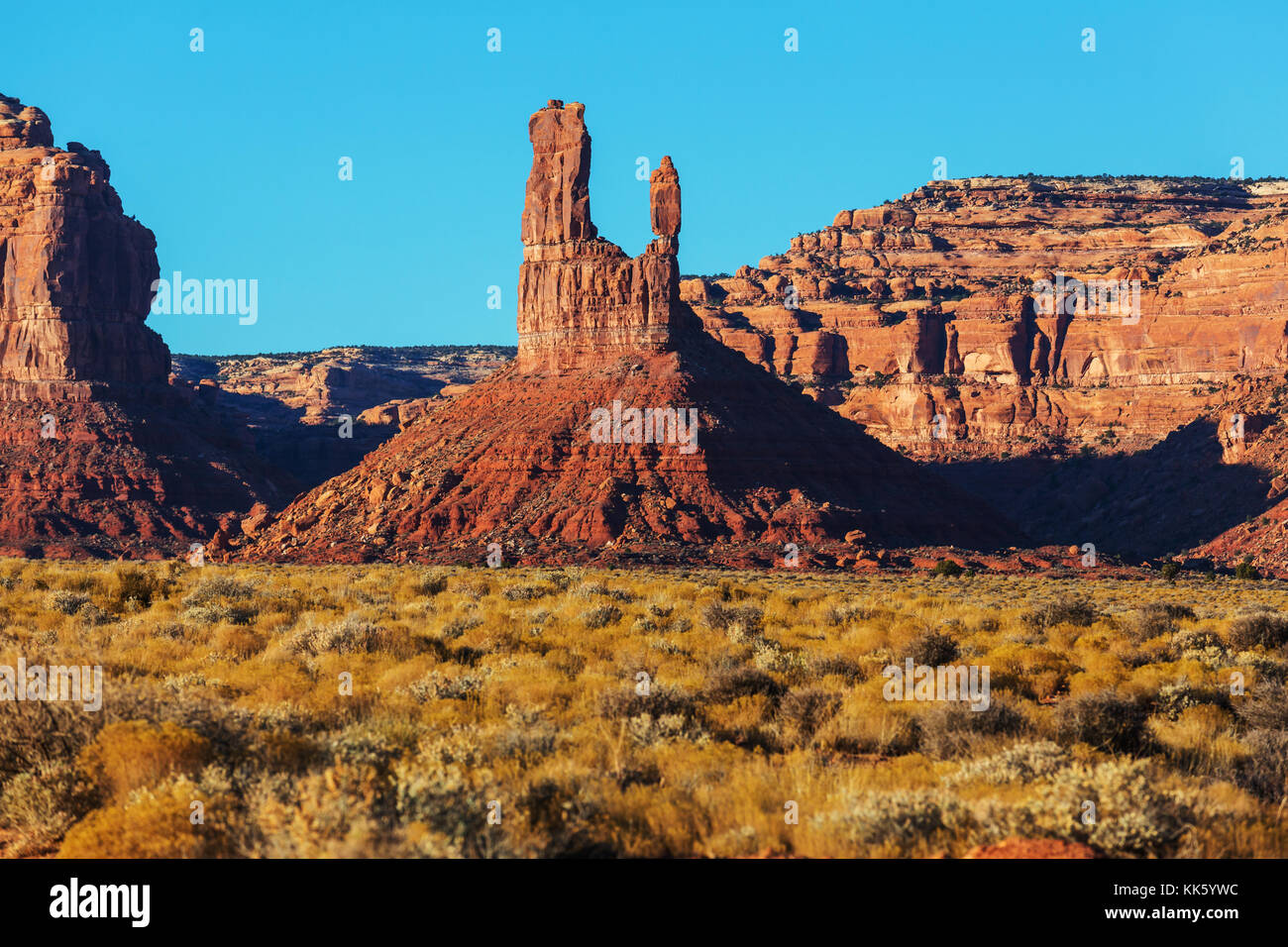 Valley of the Gods rock formation with Monument Valley at sunrise Stock ...