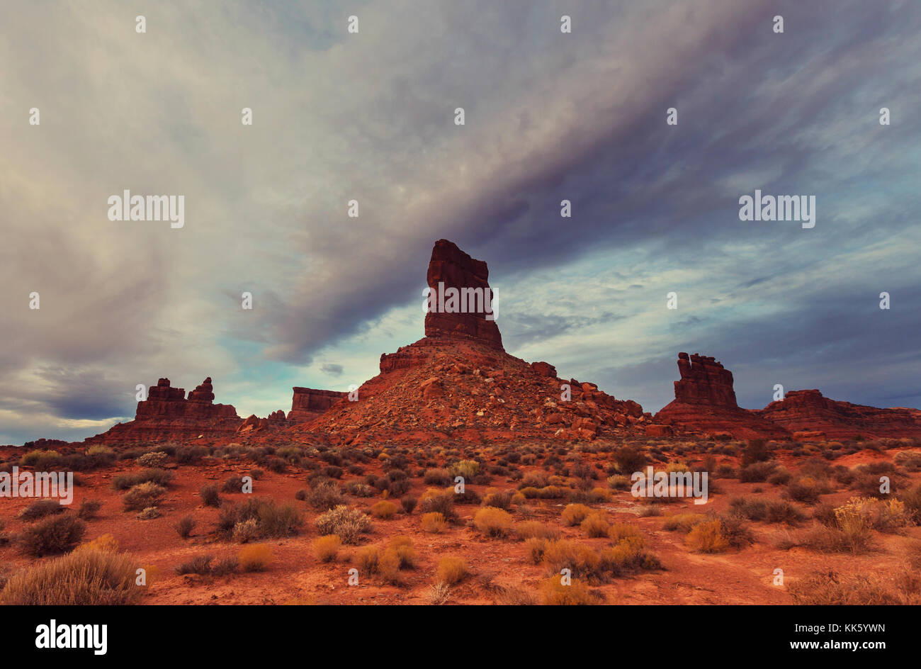 Valley of the Gods rock formation with Monument Valley at sunrise Stock ...