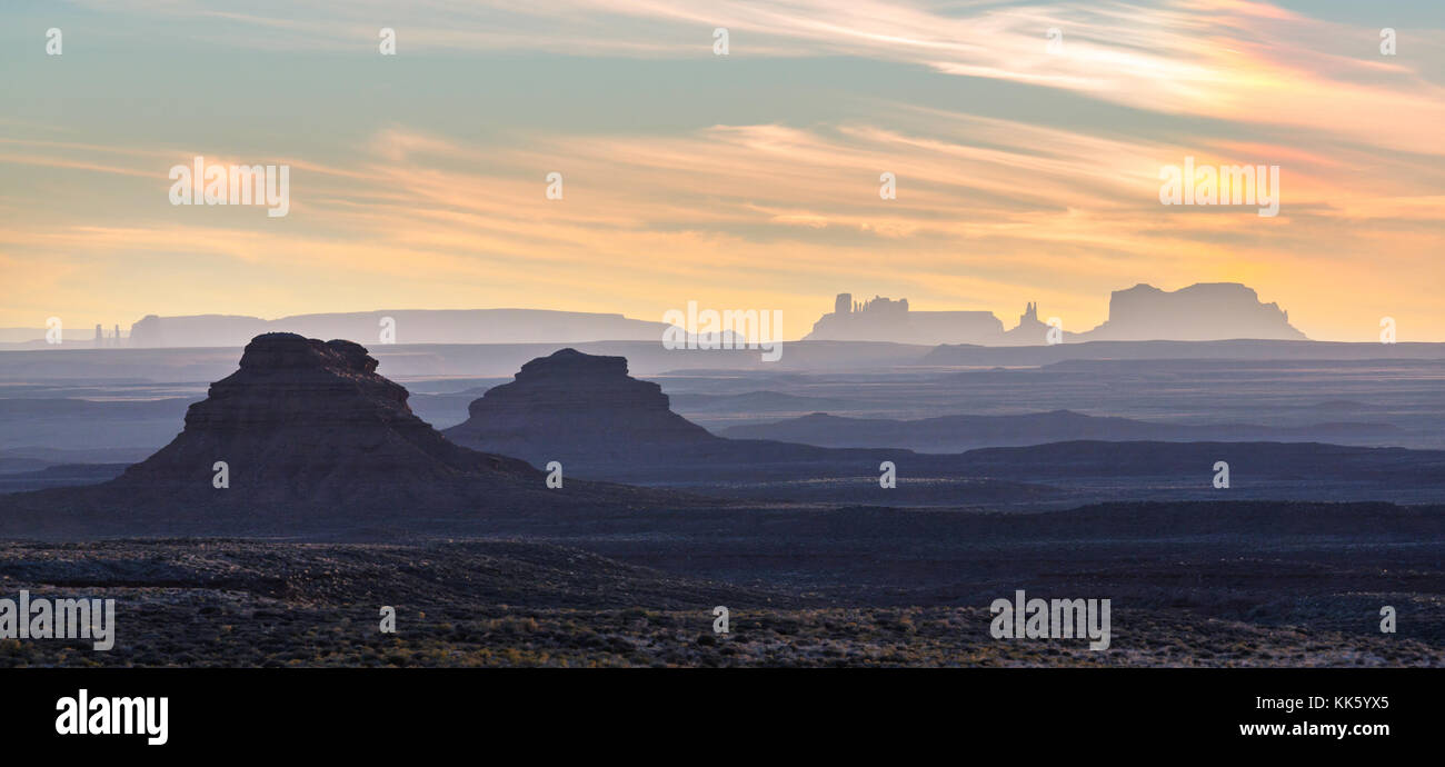 Valley of the Gods rock formation with Monument Valley at sunrise Stock ...