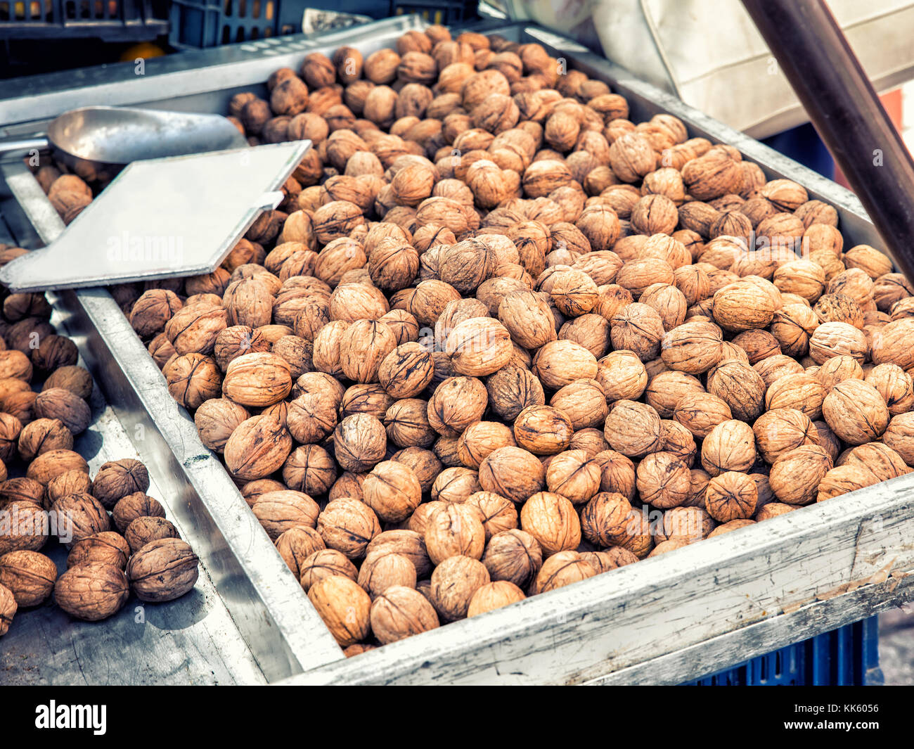 bunch of walnuts in a flea market for sale Stock Photo - Alamy
