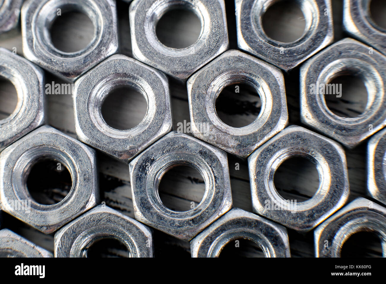 Metal nuts background. Macro. Working tools Fixing elements Stock Photo ...