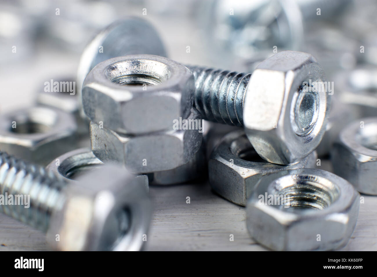 Metal nuts and bolts background. Macro. Working tools. Fixing elements ...